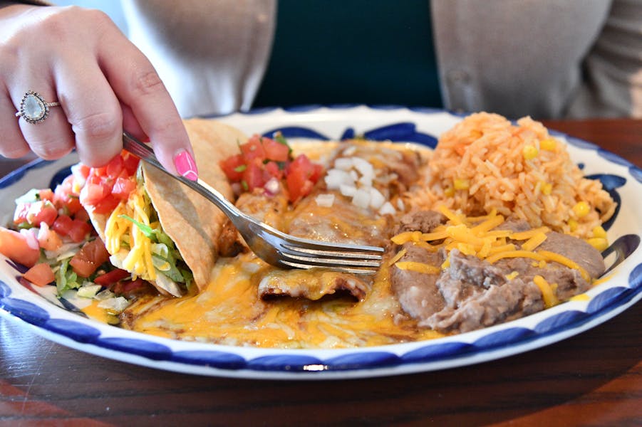 About | Cadillac Bar in Houston, TX