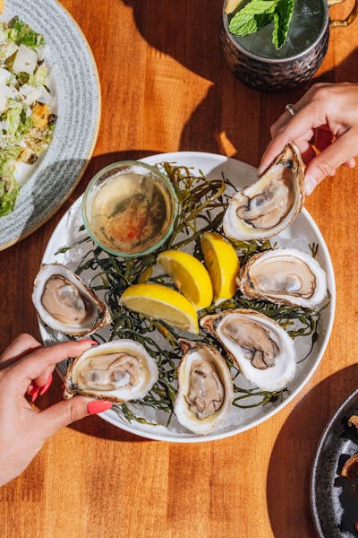 How to Prepare, Cook, and Serve Oysters | Rusty Pelican Miami ...